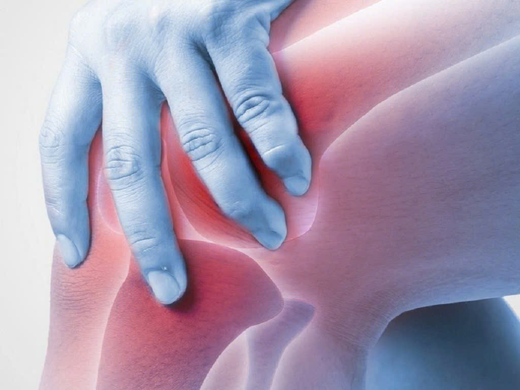 Why does joint pain often increase in cold weather?