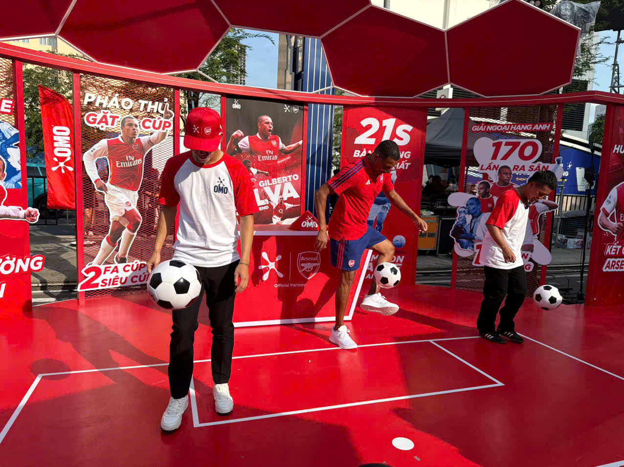 Arsenal legend Gilberto Silva wears a conical hat and juggles the ball ...
